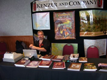 Jolly Blackburn mans the Kenzer & Company booth at Garycon I – Black Gate